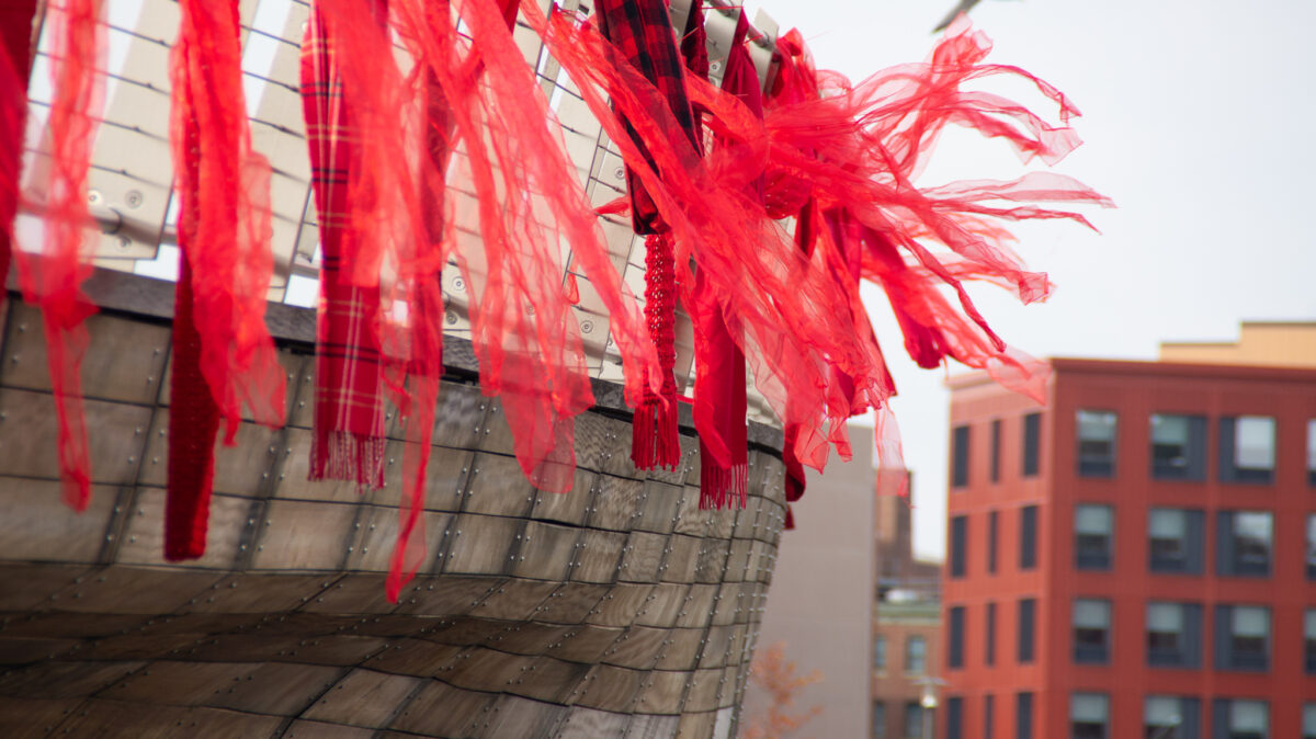 Red Scarves Across the River – APRI